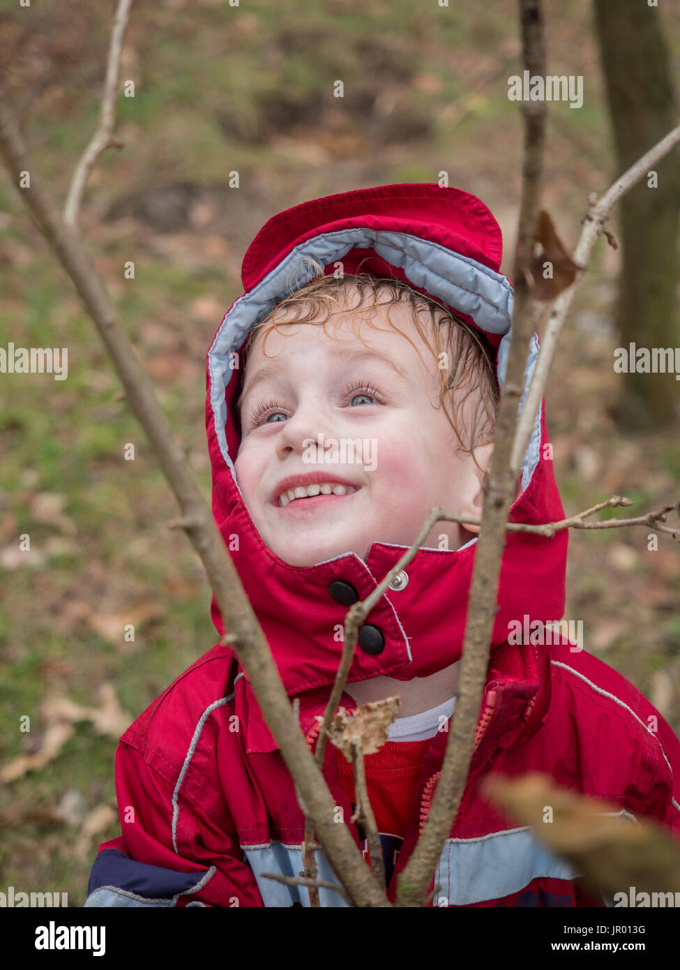 Boy in a red jacket hi-res stock photography and images - Alamy