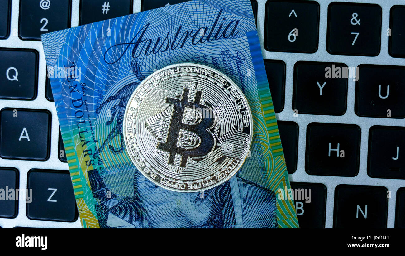 Bitcoin on Australian Dollar banknote. Electronic money exchange ...
