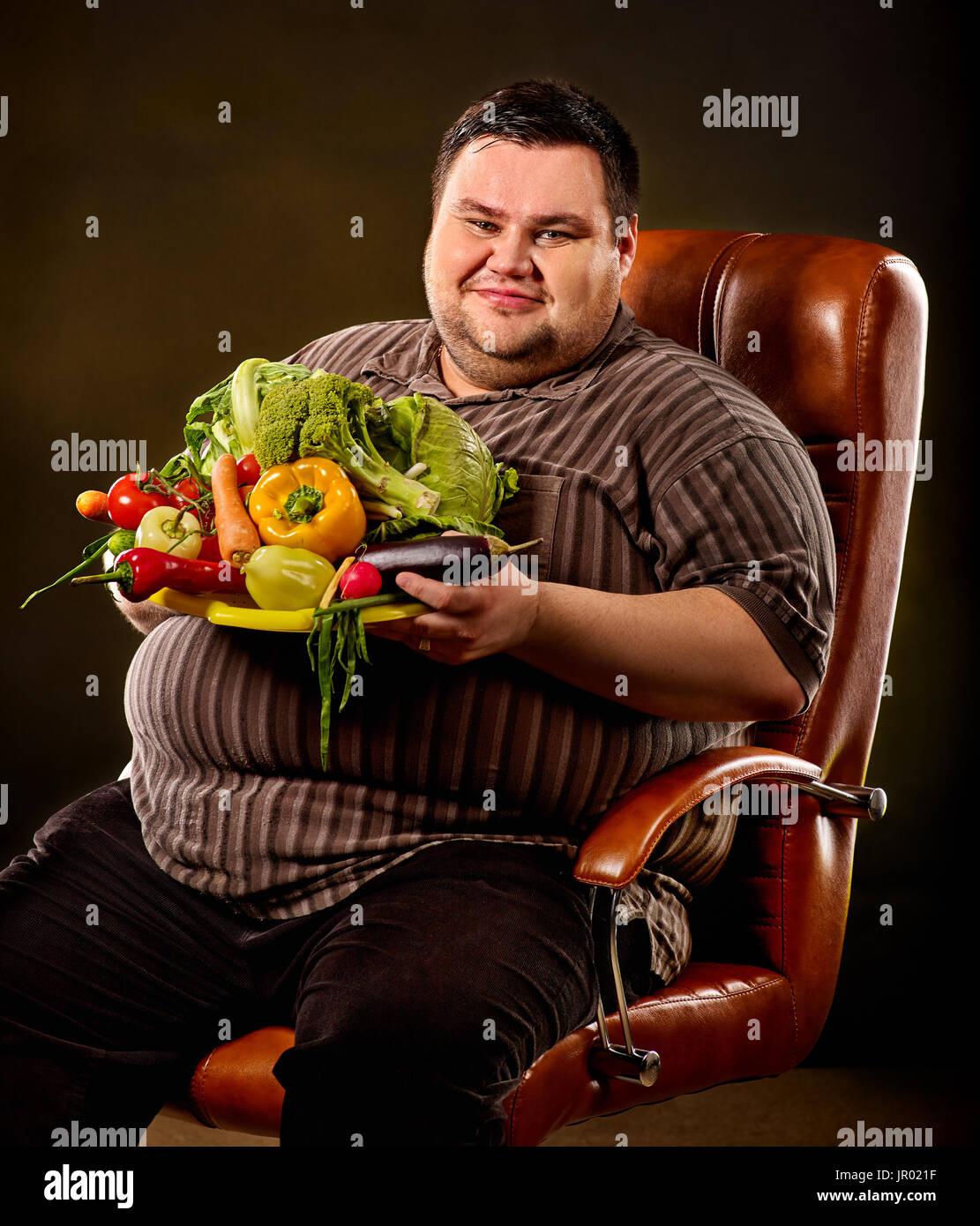 Diet fat man eating healthy food. Healthy breakfast with vegetables ...