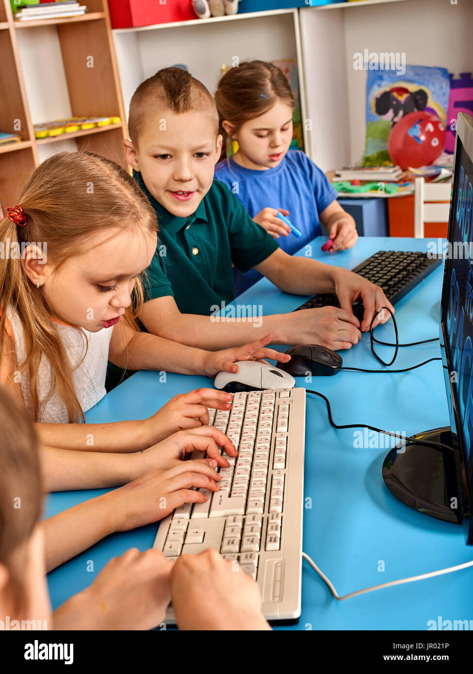 Children computer class us for education and video game Stock Photo - Alamy