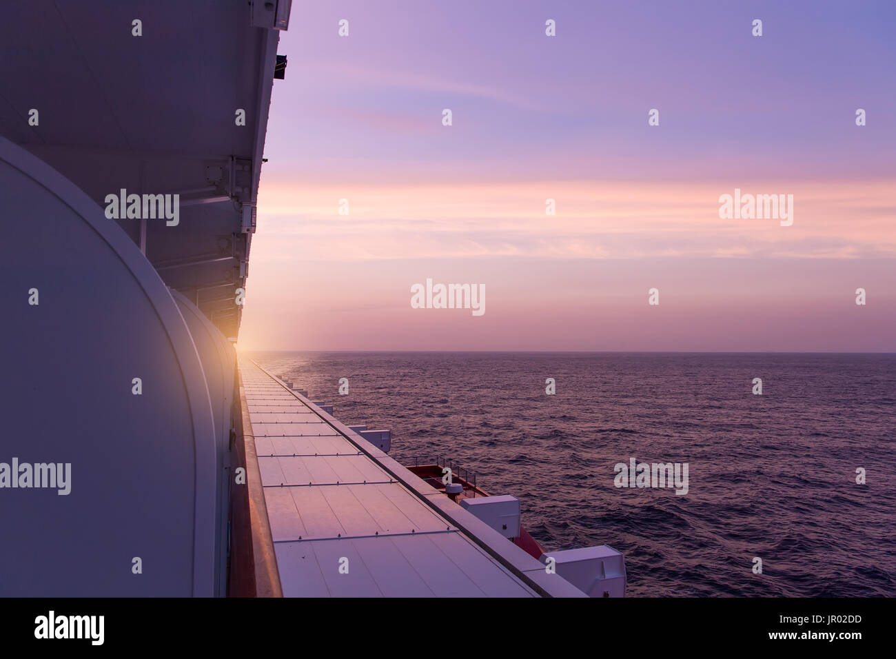 Side of ship in the ocean with sun set hi-res stock photography and ...