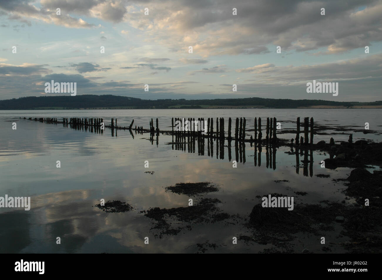 Reflections on the Loch at Beauly Firth, near Inverness Stock Photo - Alamy