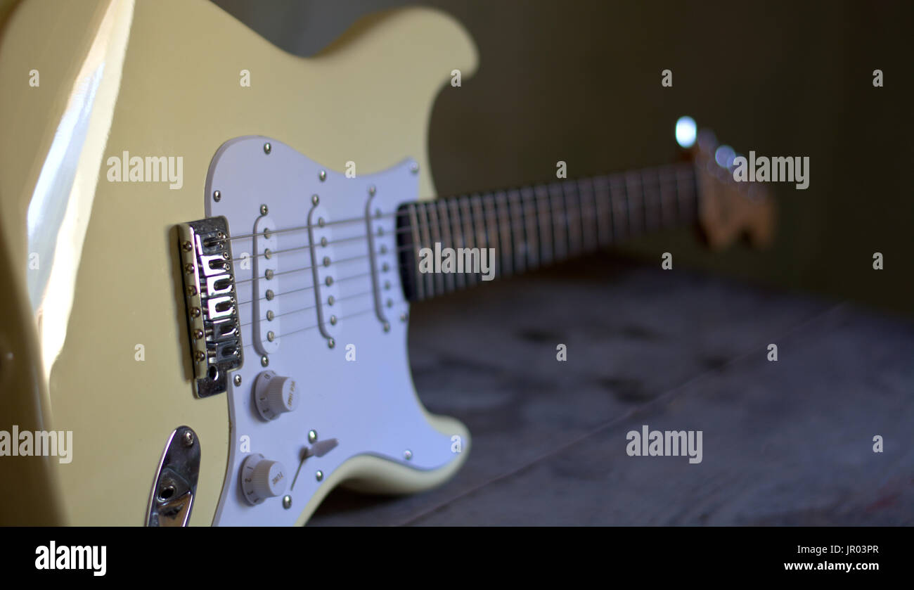 a beautiful white electric guitar Stock Photo - Alamy