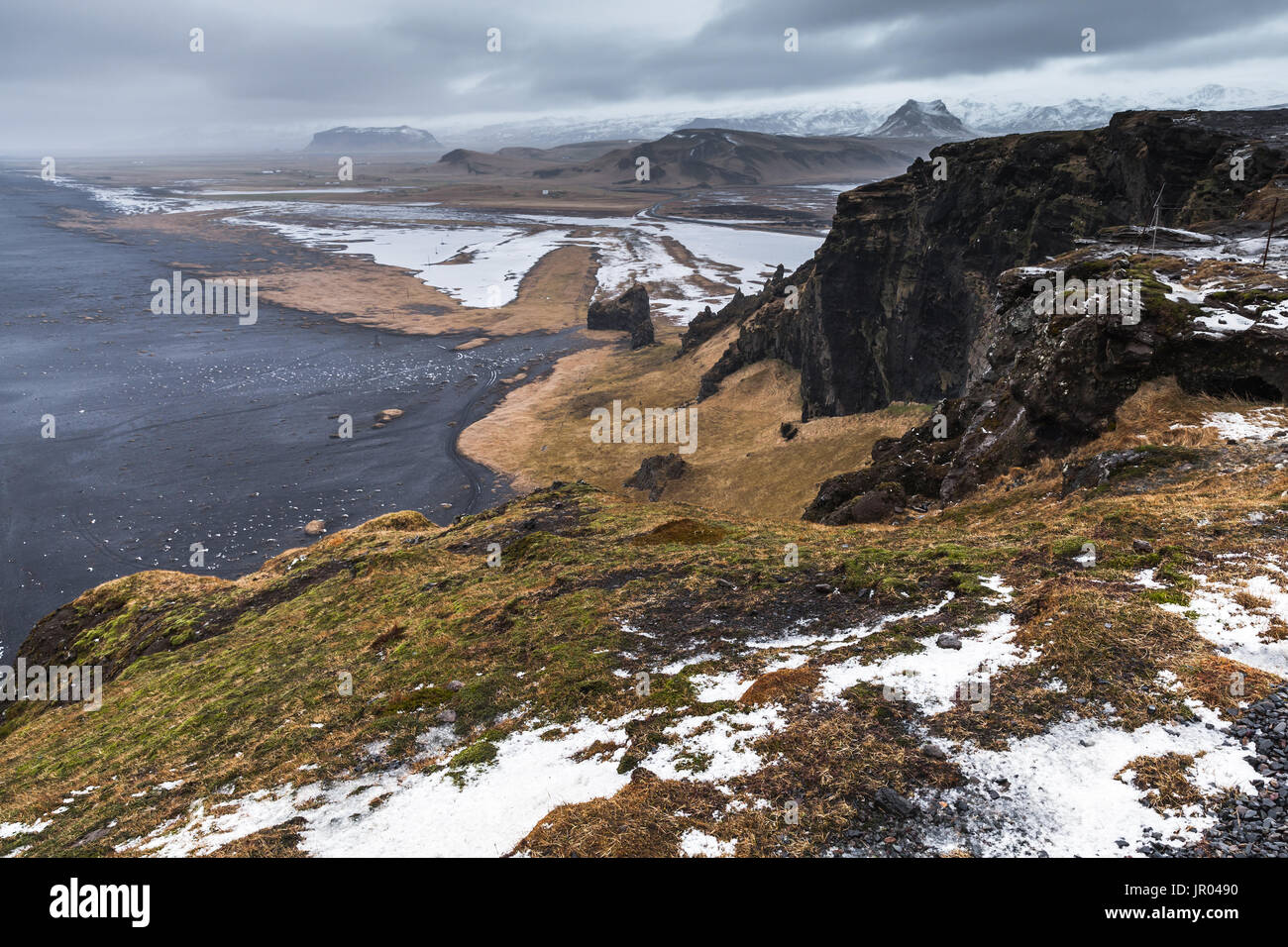 Black sand beach landscape in spring season, North Atlantic Ocean coast ...
