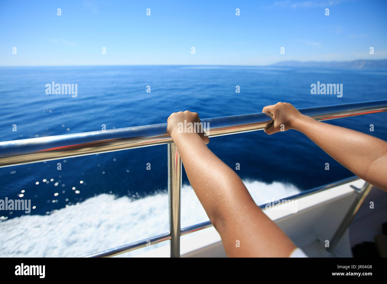 Hand of a passenger in a boat Stock Photo - Alamy