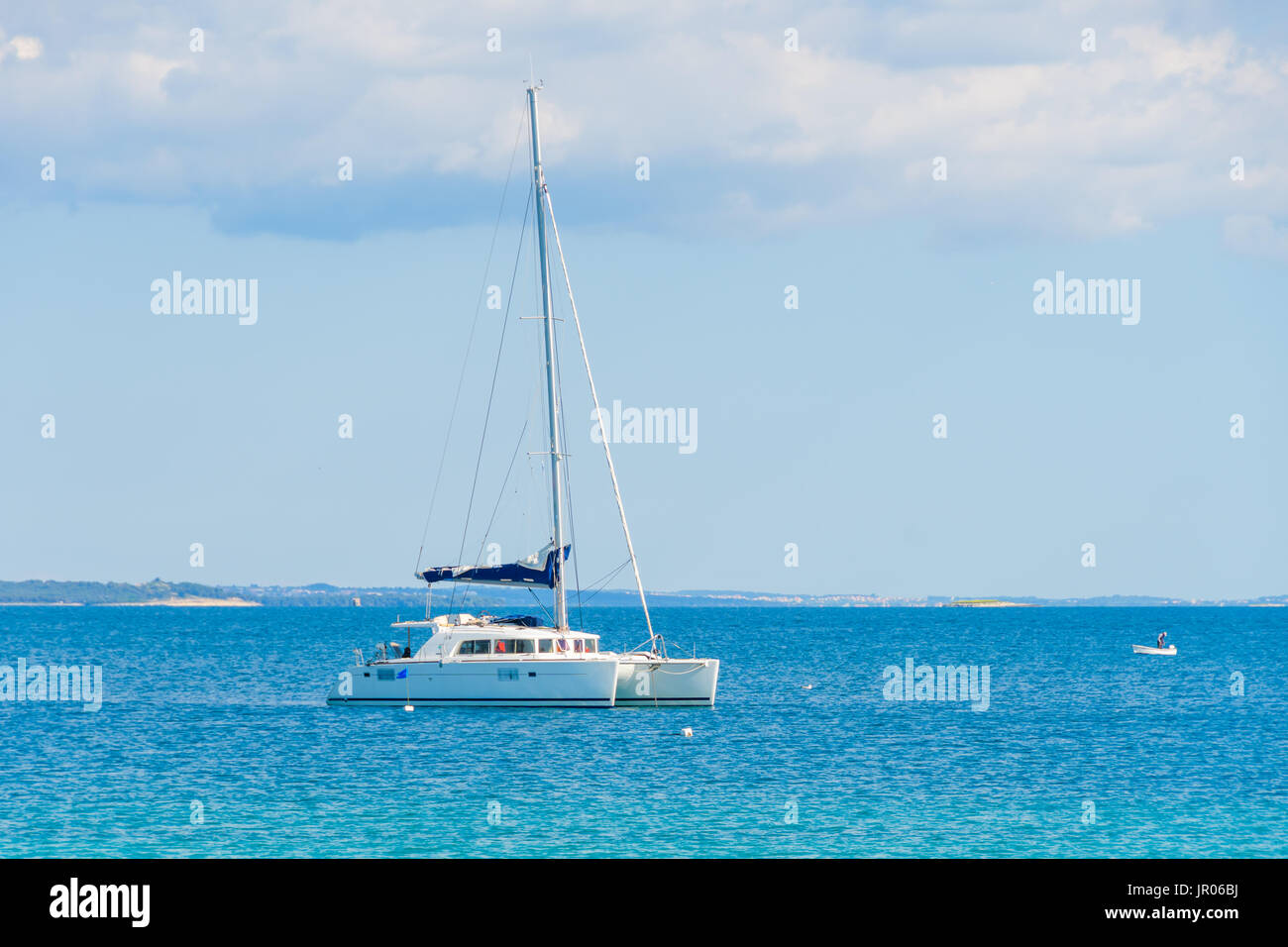 Luxury sailing catamaran in open sea Stock Photo - Alamy