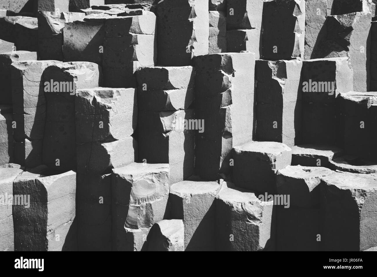 Bed of volcanic hexagonal rocks basalt columns at the Giant`s Causeway ...