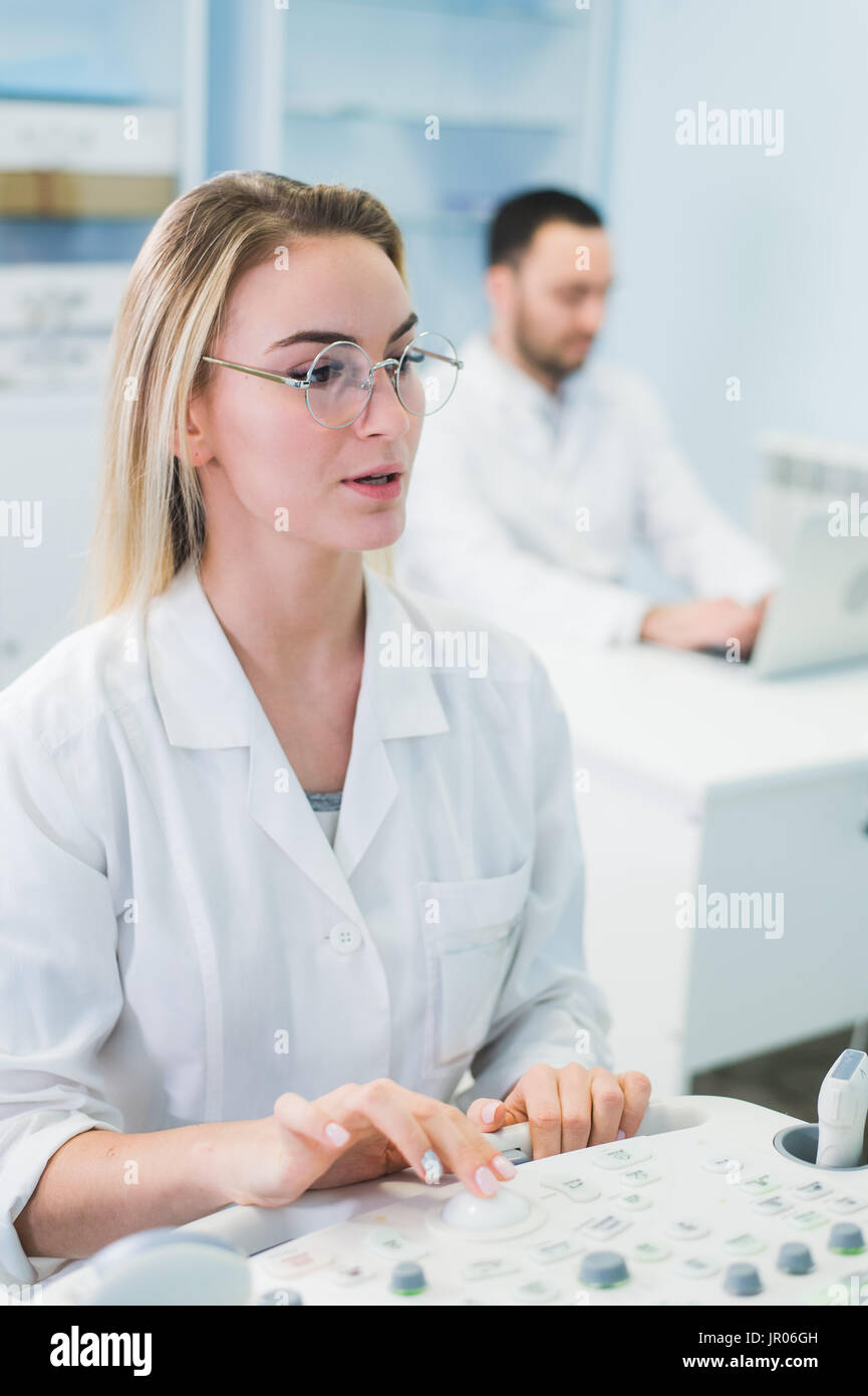 Doctor working in science laboratory hi-res stock photography and ...