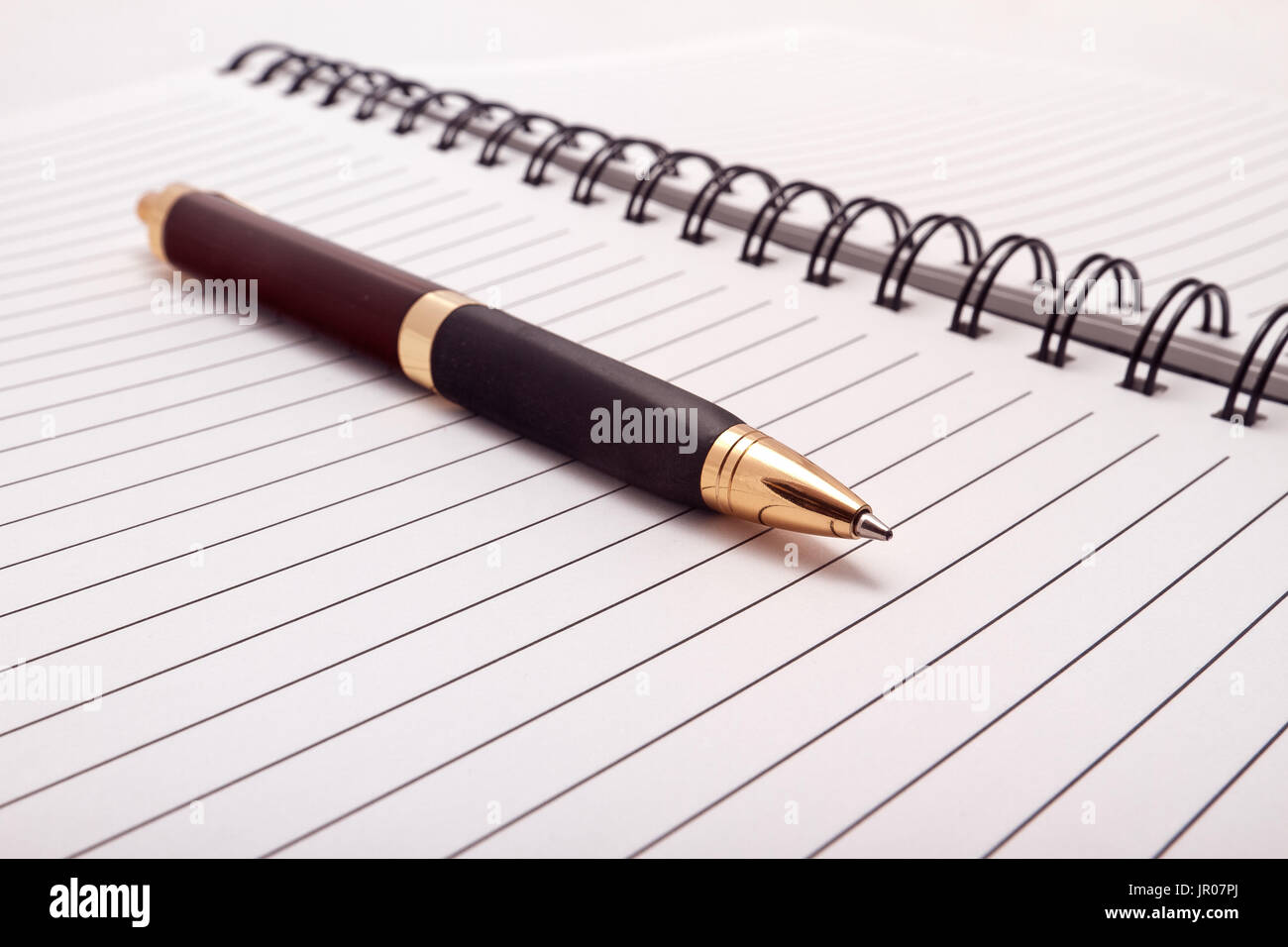 Spiral brown notebook pen hi-res stock photography and images - Alamy