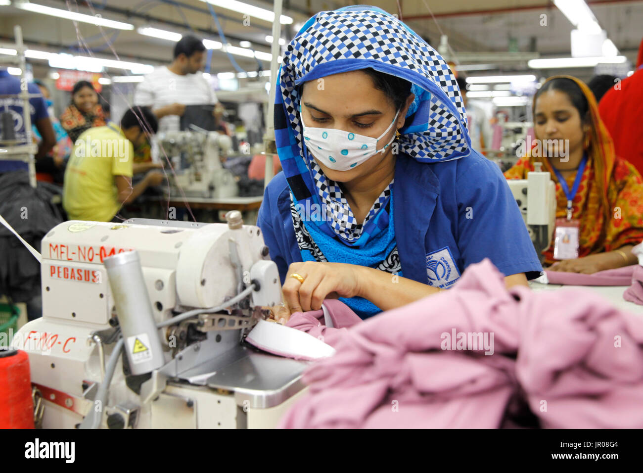 Female workers in a Sewing Section of a ready-made garment factory in ...