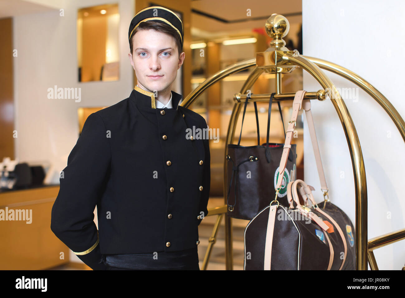 Hotel uniform hi-res stock photography and images - Alamy