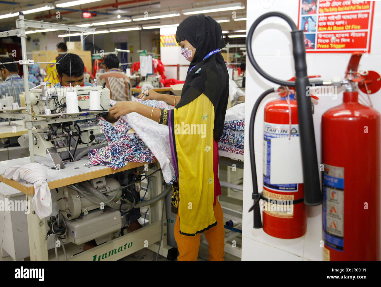 Female workers in a Sewing Section of a ready-made garment factory in ...
