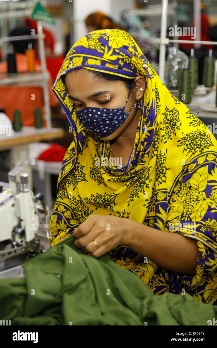 Female workers in a Sewing Section of a ready-made garment factory in ...