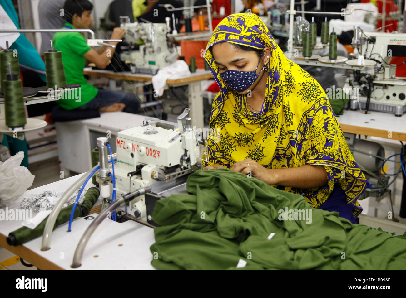 Female workers in a Sewing Section of a ready-made garment factory in ...