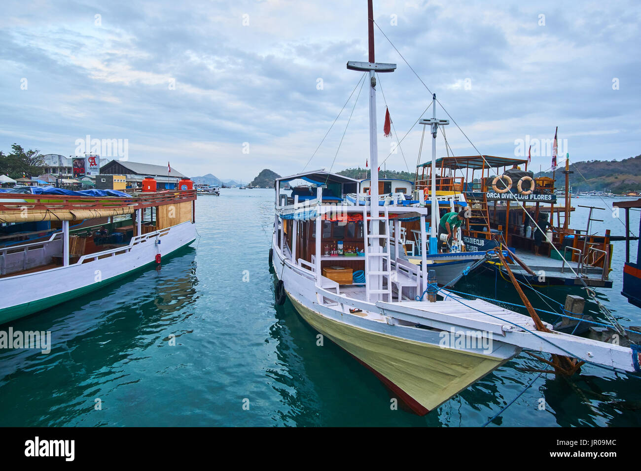 boats at labuan bajo harbour Stock Photo - Alamy
