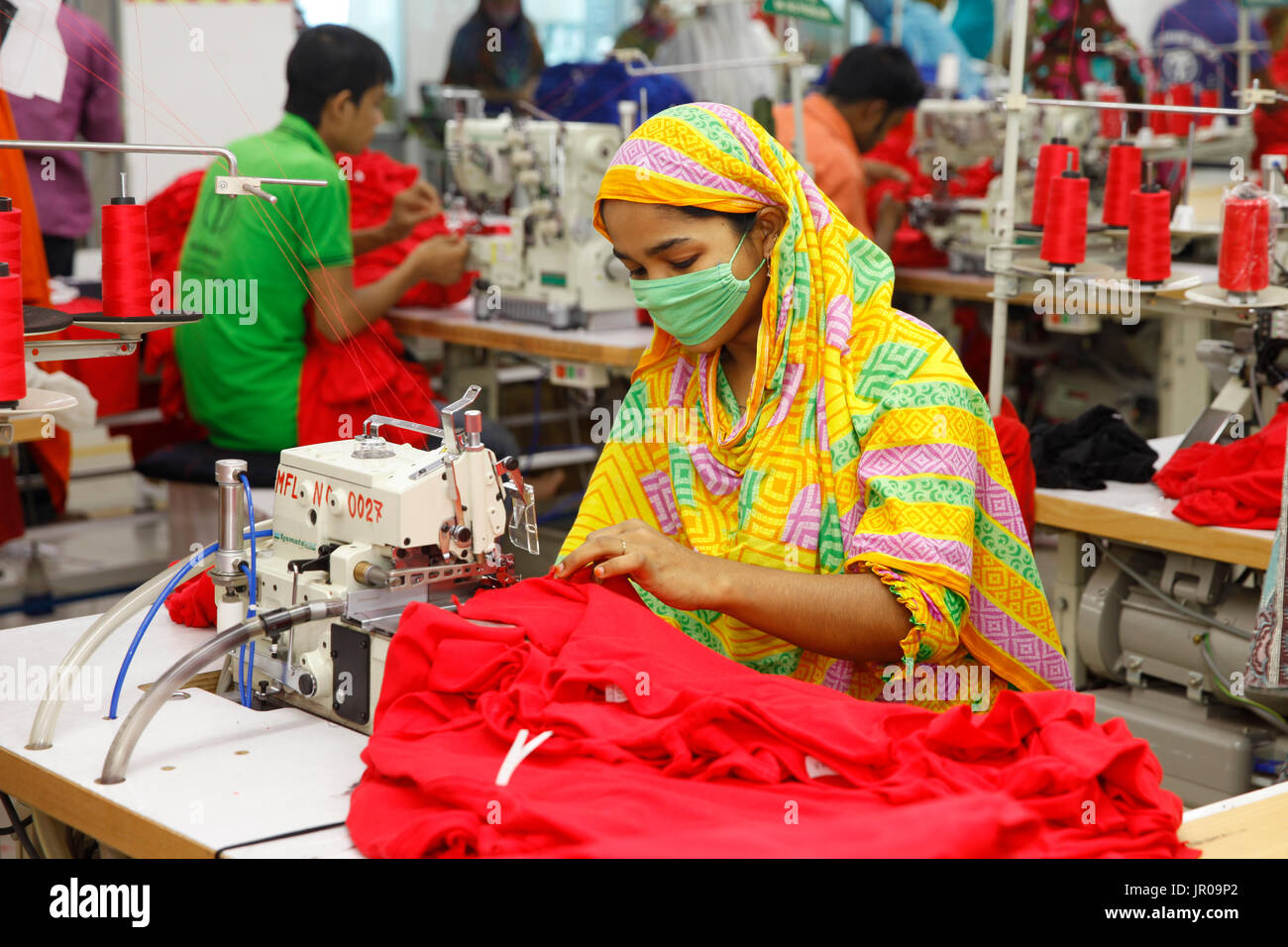 Ready-made garment workers participate in a fire fighting training ...