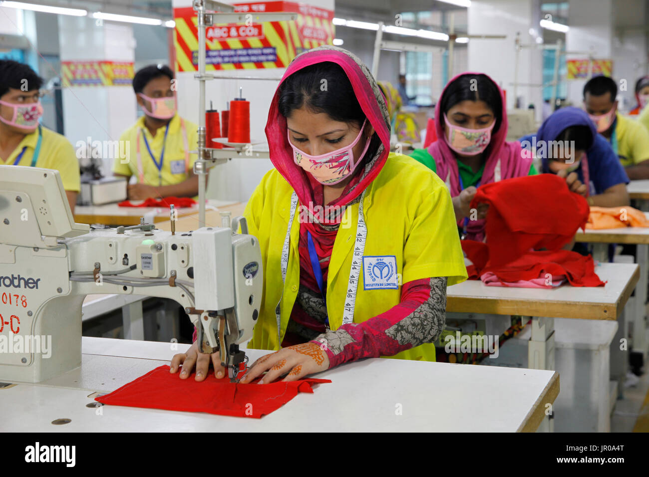 Female workers in a sewing section of a ready-made garment factory in ...