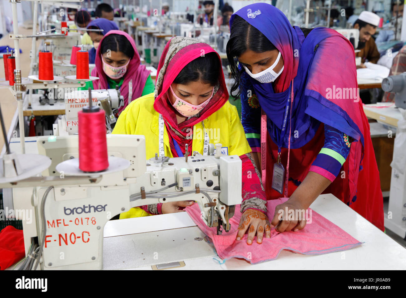 Ready-Made Garment workers having knit training in a factory in Gazipur ...