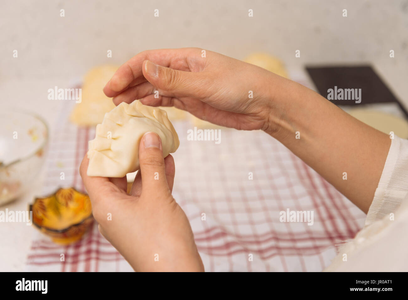 Preparing a Handmade Dumpling at Home Stock Photo - Alamy