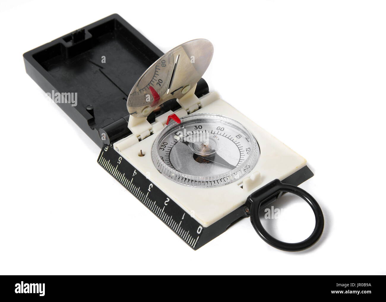vintage travel compass on white Stock Photo - Alamy