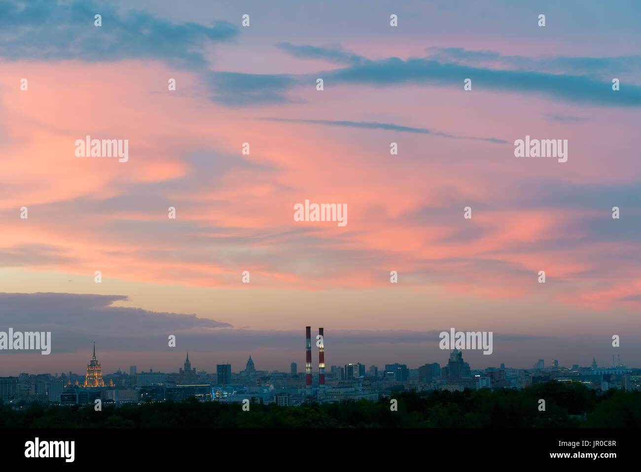 The buildings of Moscow city center at sunset time. Industrial ...