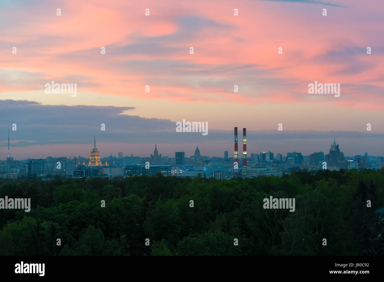 The buildings of Moscow city center at sunset time. Industrial ...