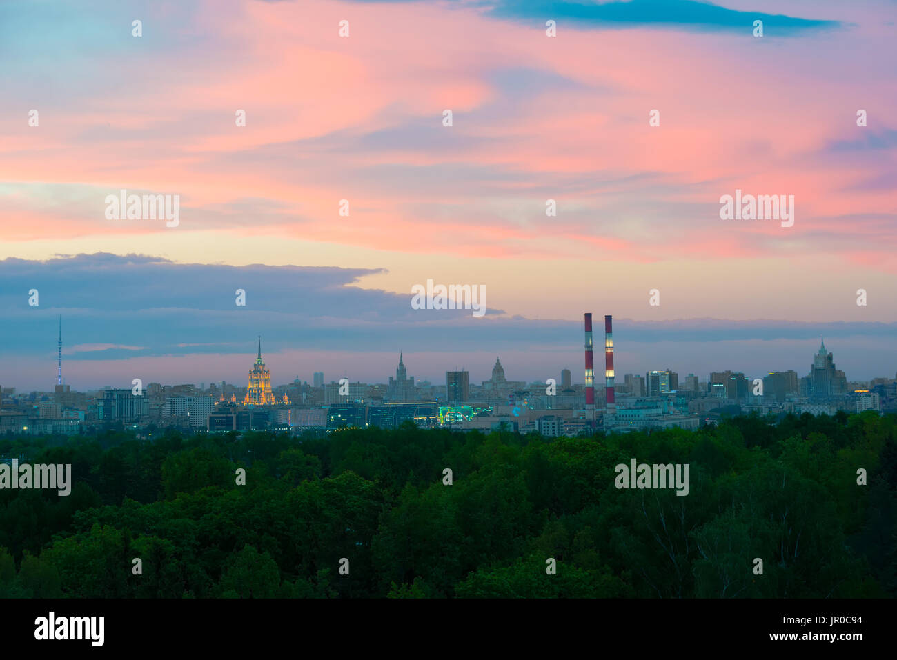 The buildings of Moscow city center at sunset time. Industrial ...