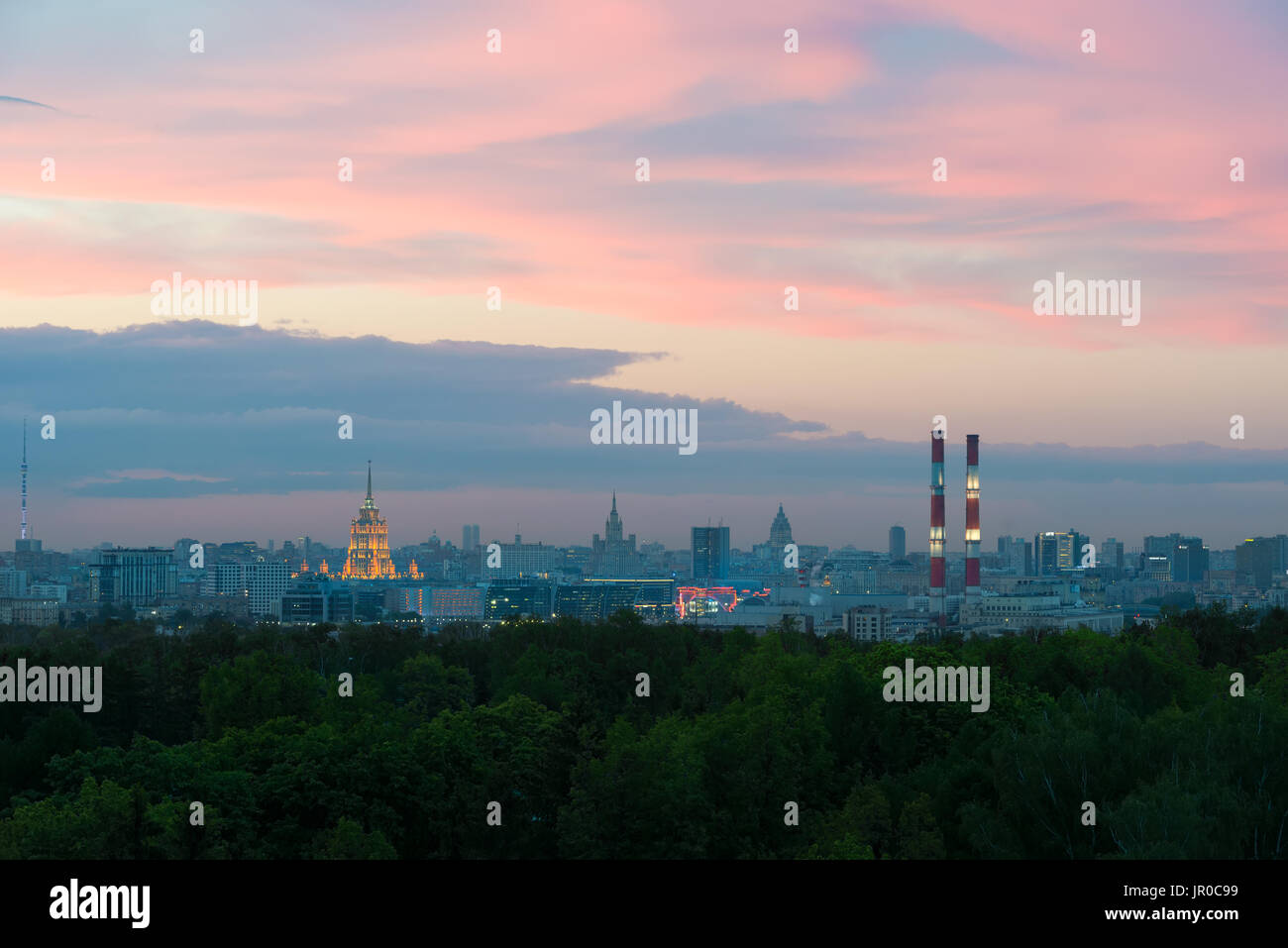 The buildings of Moscow city center at sunset time. Industrial ...