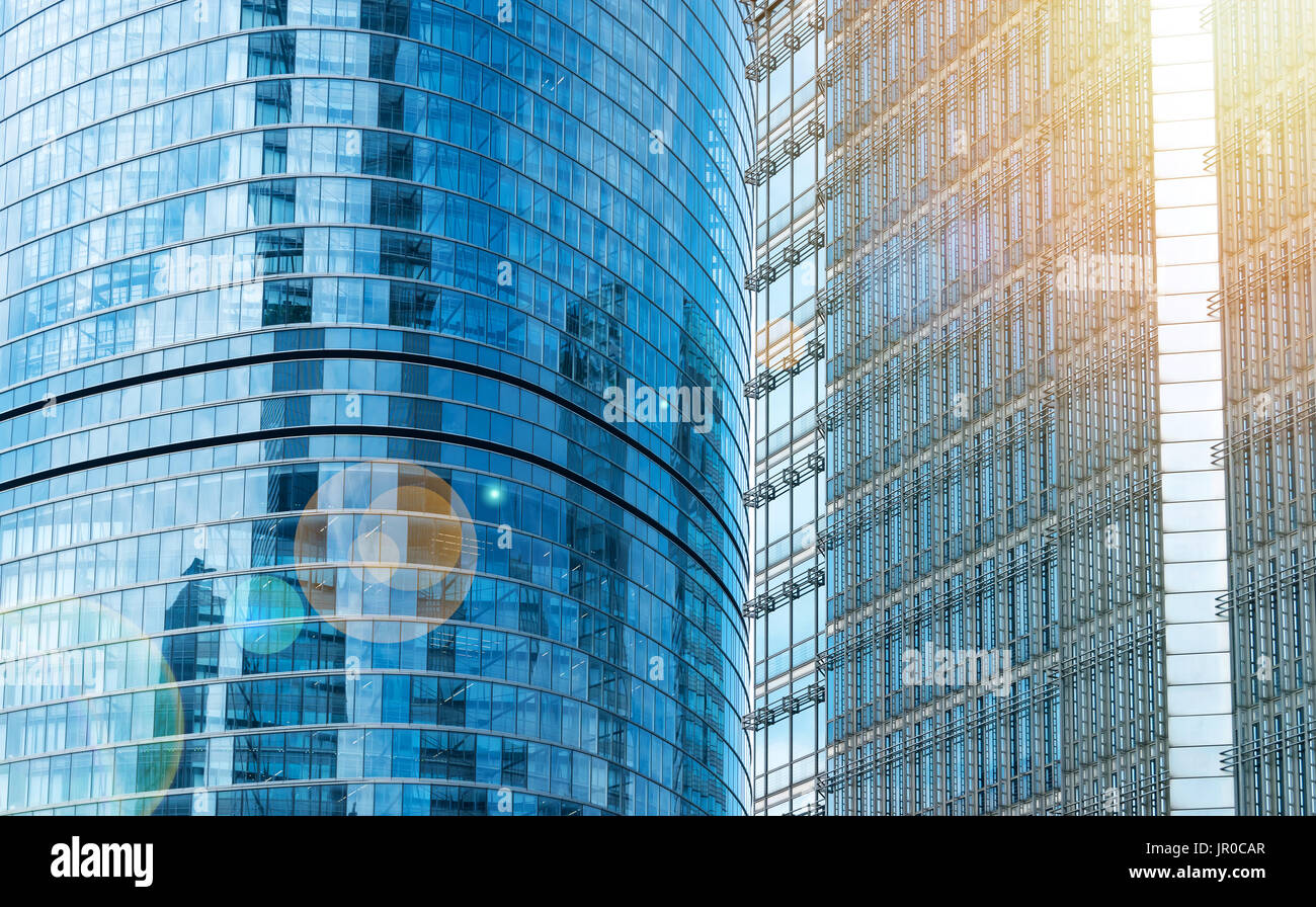 Side view of modern windows glass skyscrapers in business district city ...