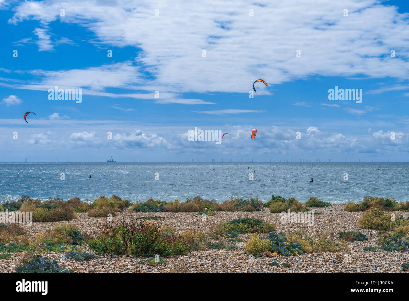 Kite surfing playing on the sea in Shoreham Stock Photo - Alamy