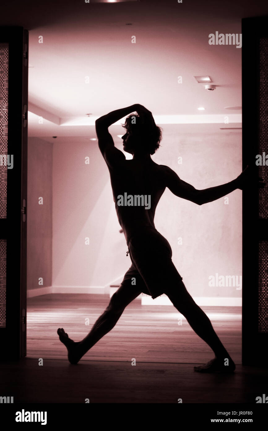 Male Yoga Teacher Doing Handstand Calisthenics And Yoga Asana Practice In Gym Fitness Pilates