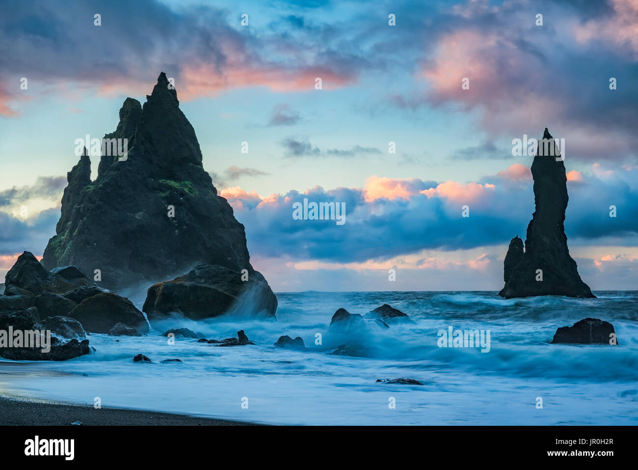 The Sea Stacks Known As Reynisdrangar With Waves And Sunrise Happening ...