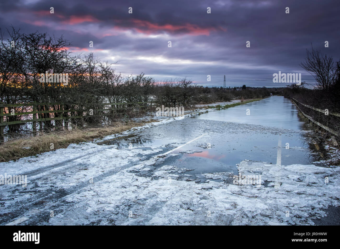 Flooded Road With Snow And Water In Winter At Sunset; South Tyneside ...