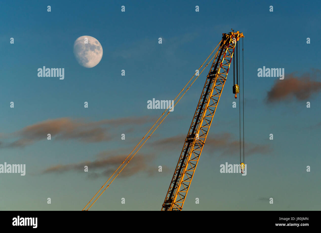 Crane with moon hi-res stock photography and images - Alamy