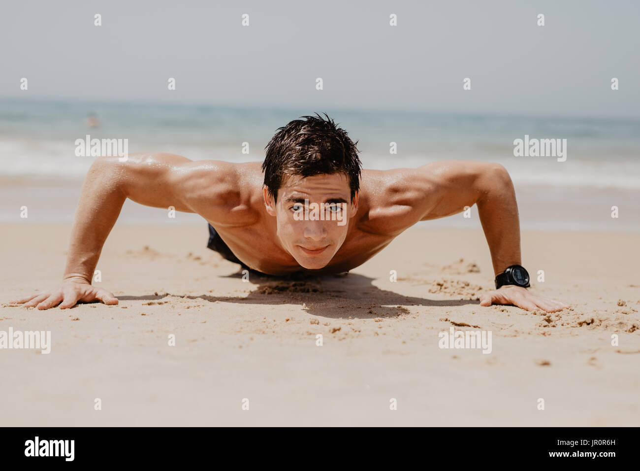 Body builder beach hi-res stock photography and images - Alamy