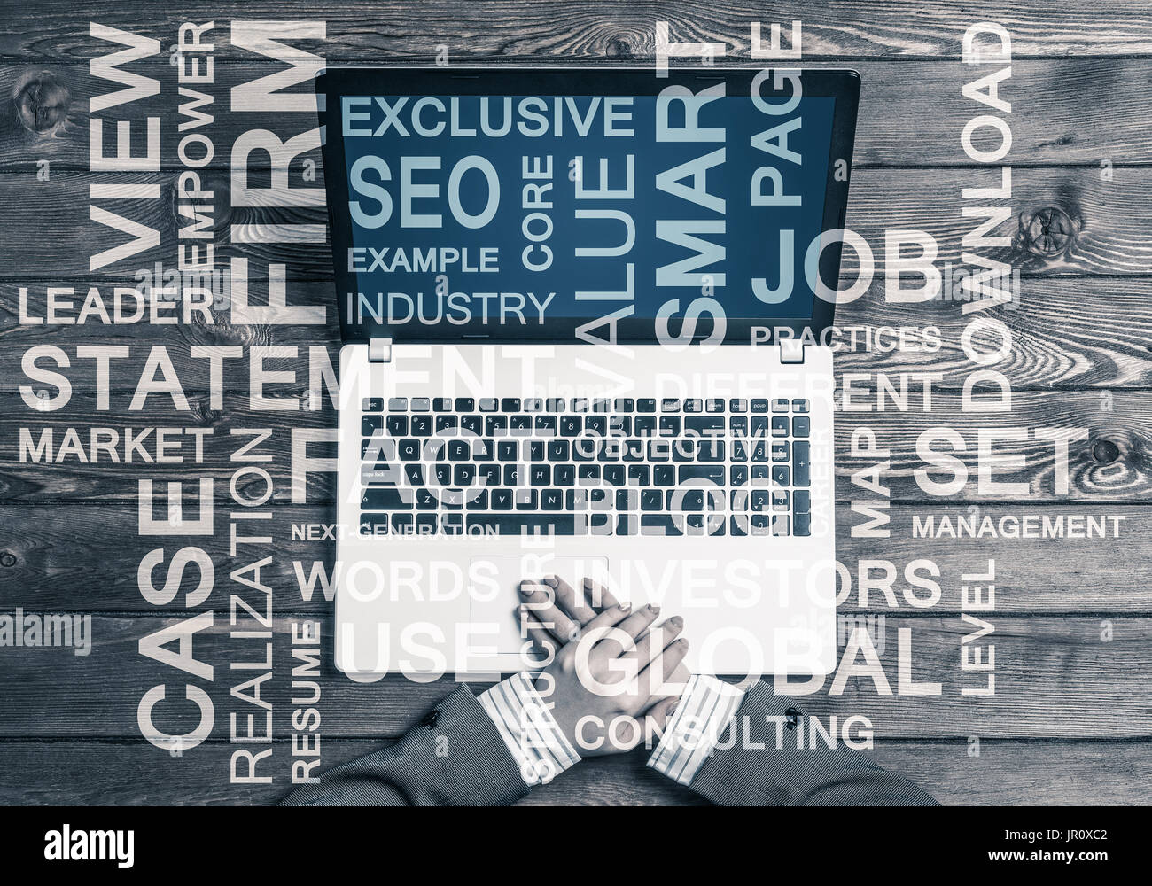 Business workplace with laptop and business conceptual words Stock ...