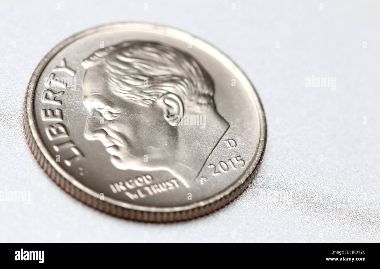 Dime isolated on a silver background Stock Photo - Alamy
