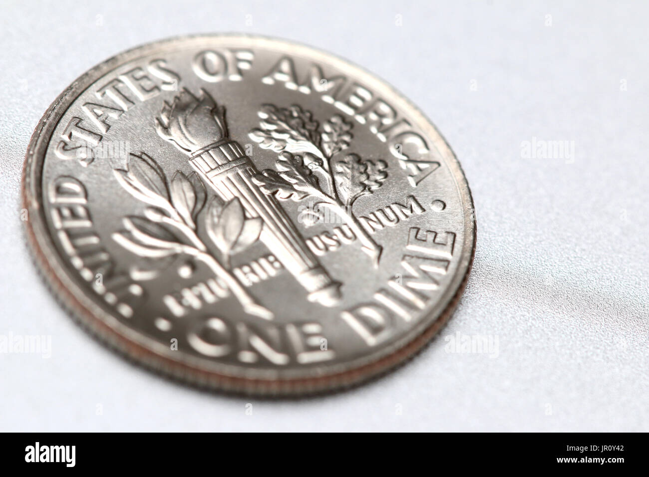 Dime isolated on a silver background Stock Photo - Alamy