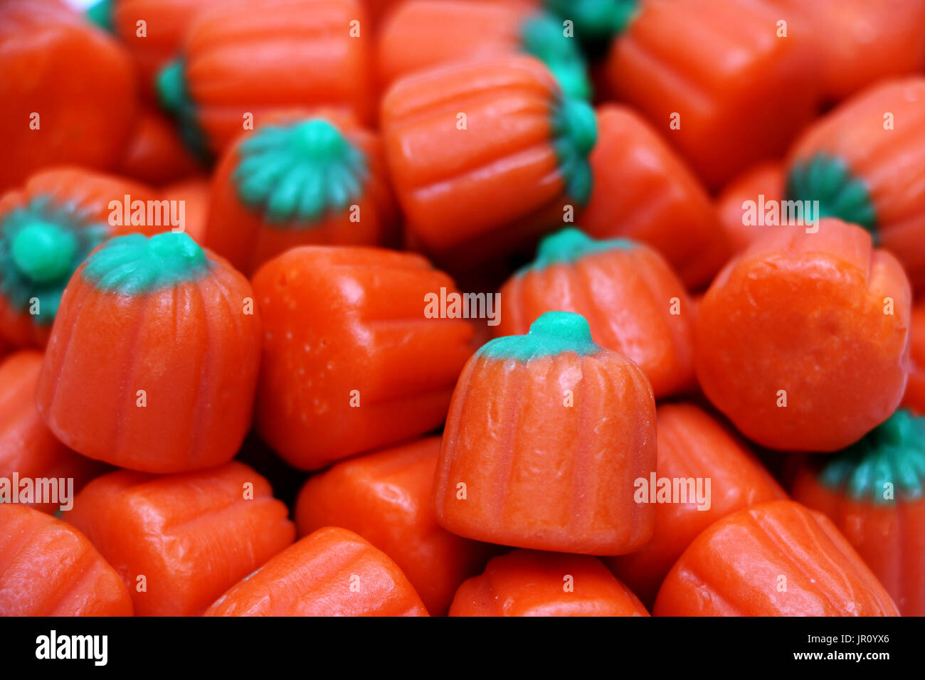 A background of candy pumpkins Stock Photo - Alamy
