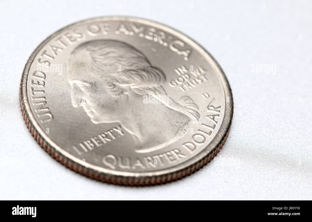 Quarter isolated on a silver background Stock Photo - Alamy