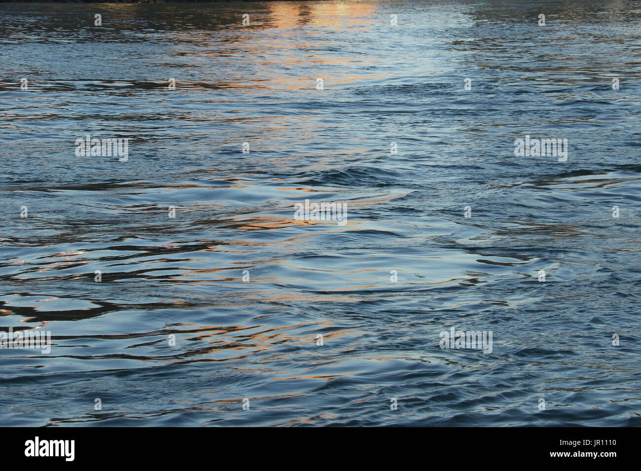 Reflections on quiet sea hi-res stock photography and images - Alamy