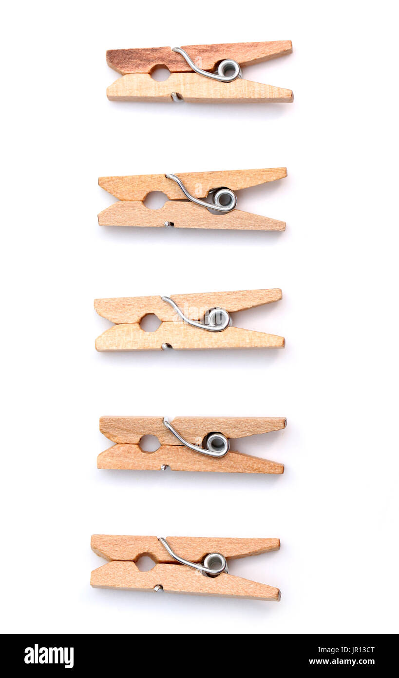 Wooden Clothes Pins isolated on a white background Stock Photo - Alamy