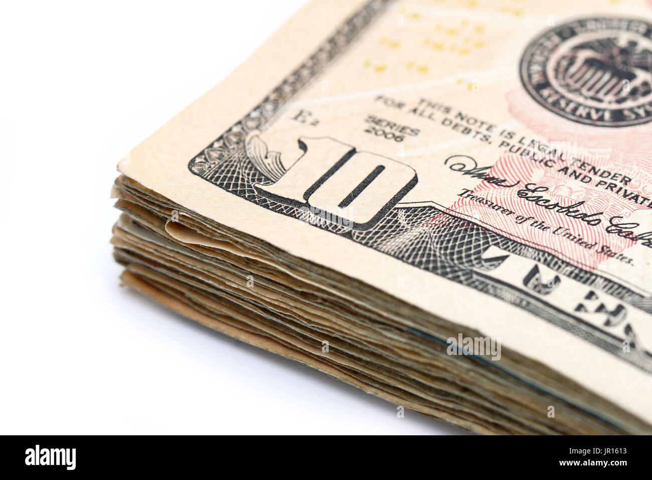 A stack of ten dollar bills isolated on a white background Stock Photo ...