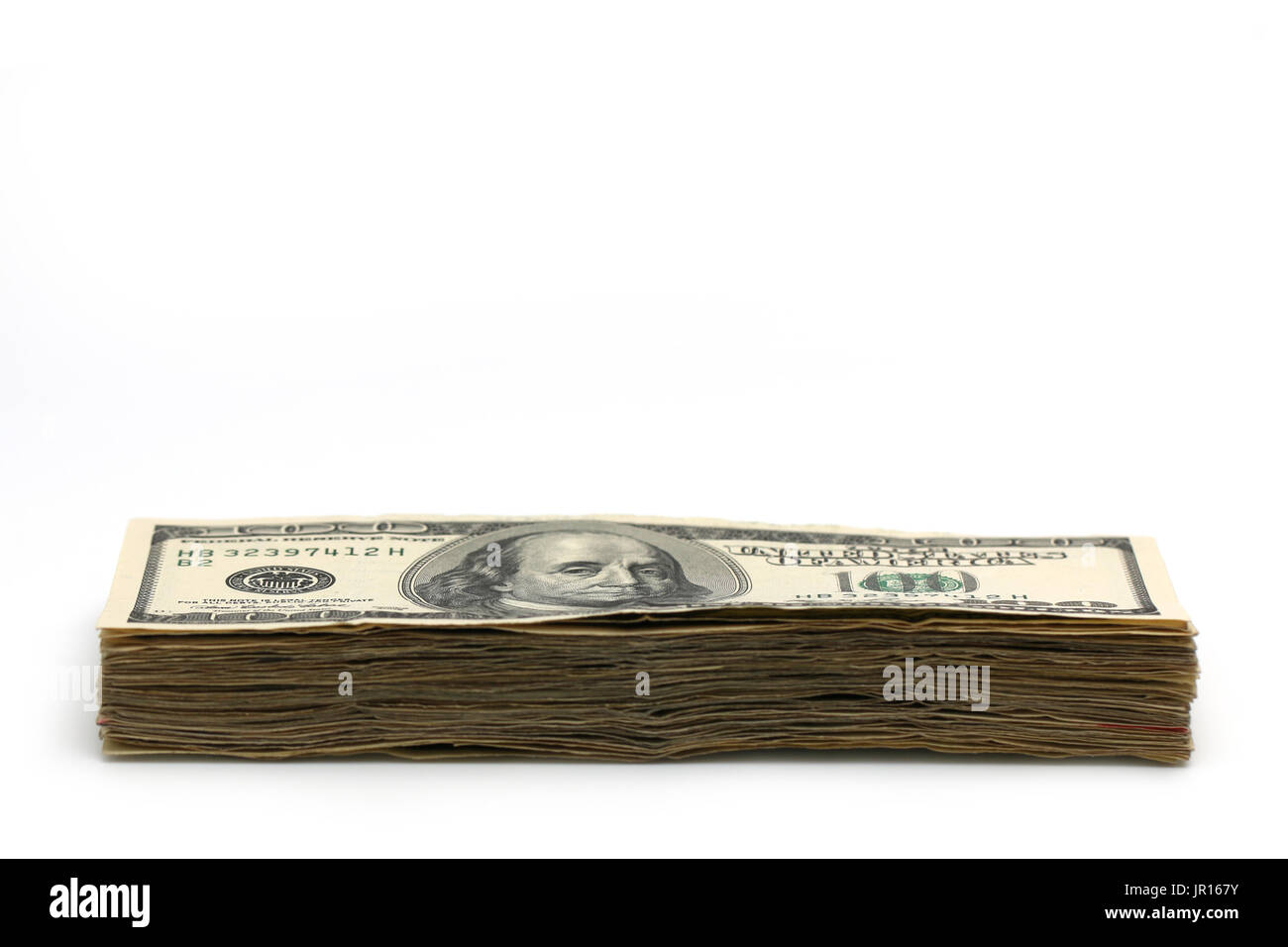 A stack of hundred dollar bills isolated on a white background Stock ...