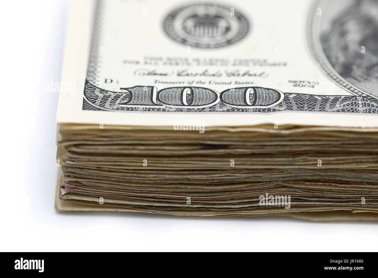 A stack of hundred dollar bills isolated on a white background Stock ...