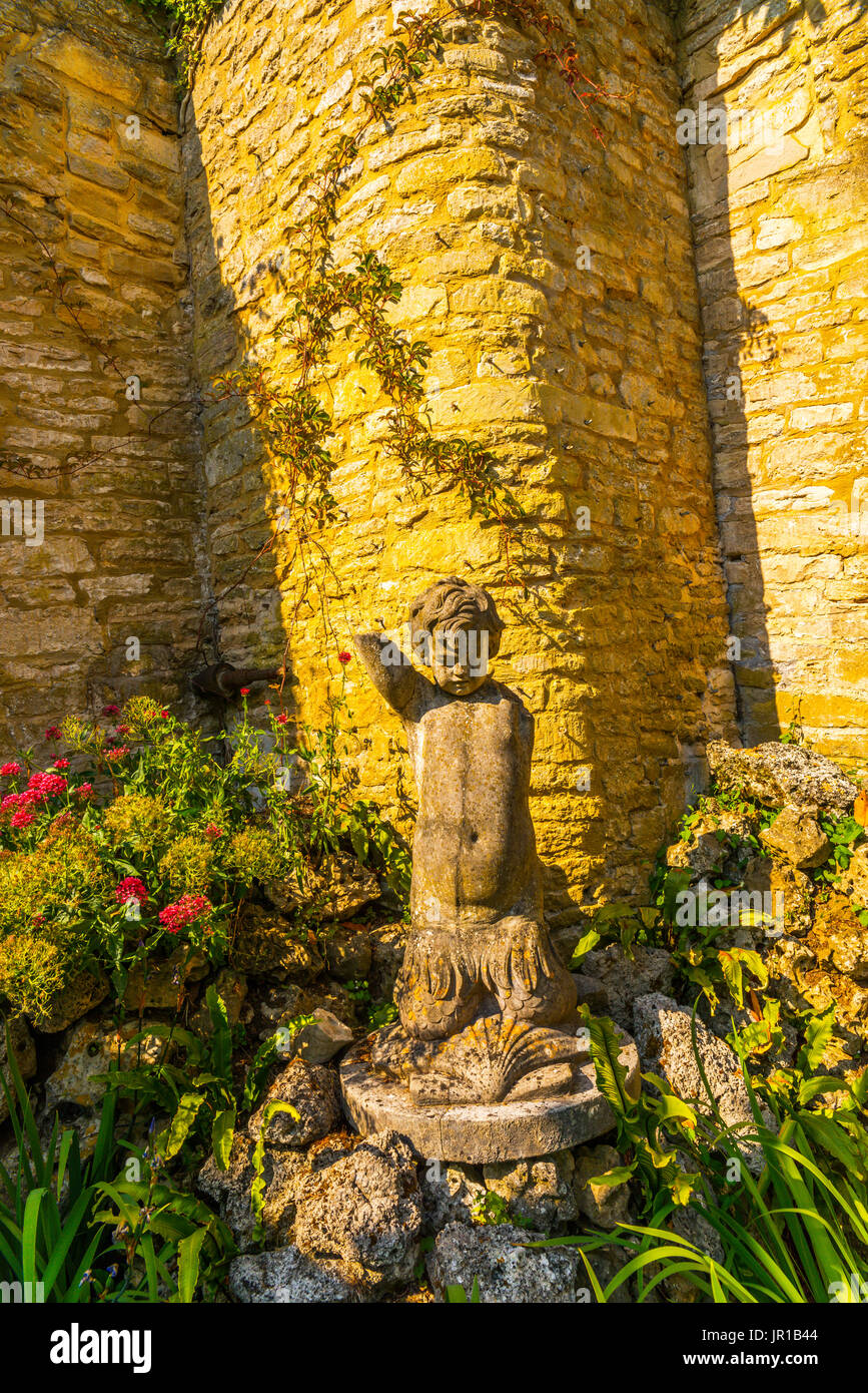 Old sculpture on the pedestal, beautifully preserved old artistic ...