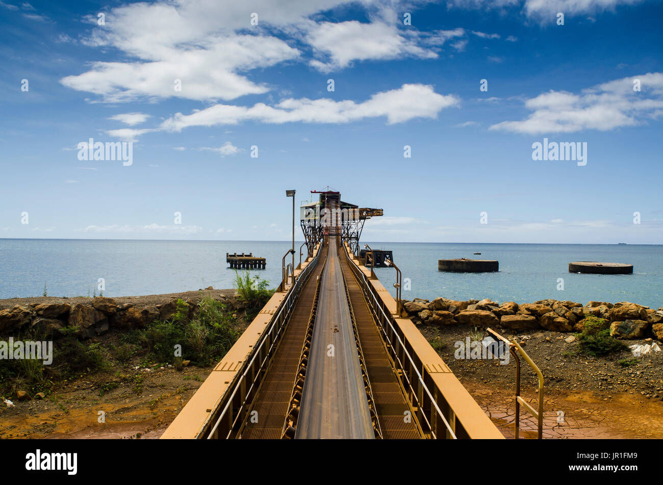 Conveyor (conveyor belt) conveying the ore to the sea to be loaded onto ...