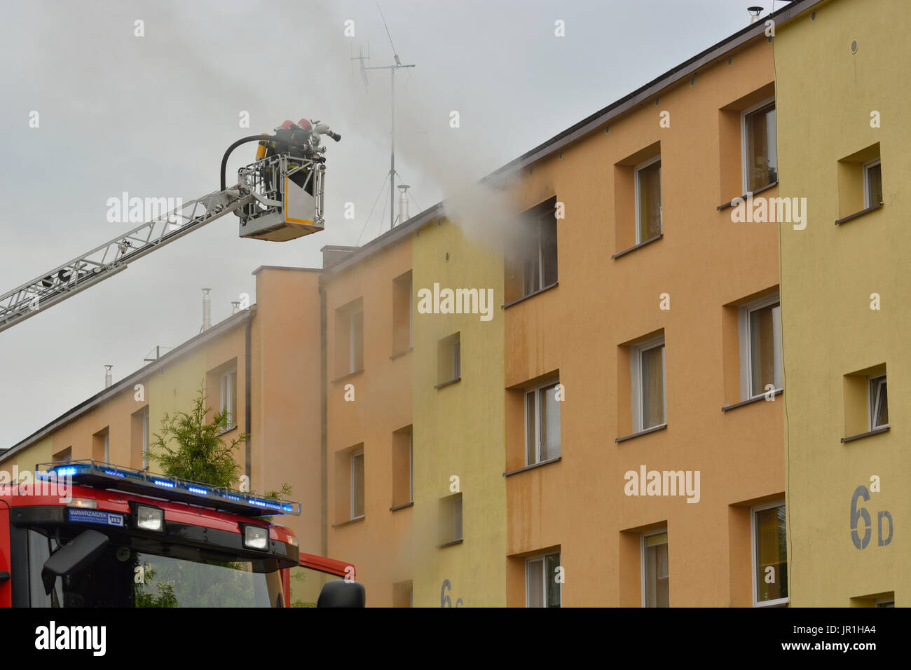 Fire in the apartment block Stock Photo - Alamy