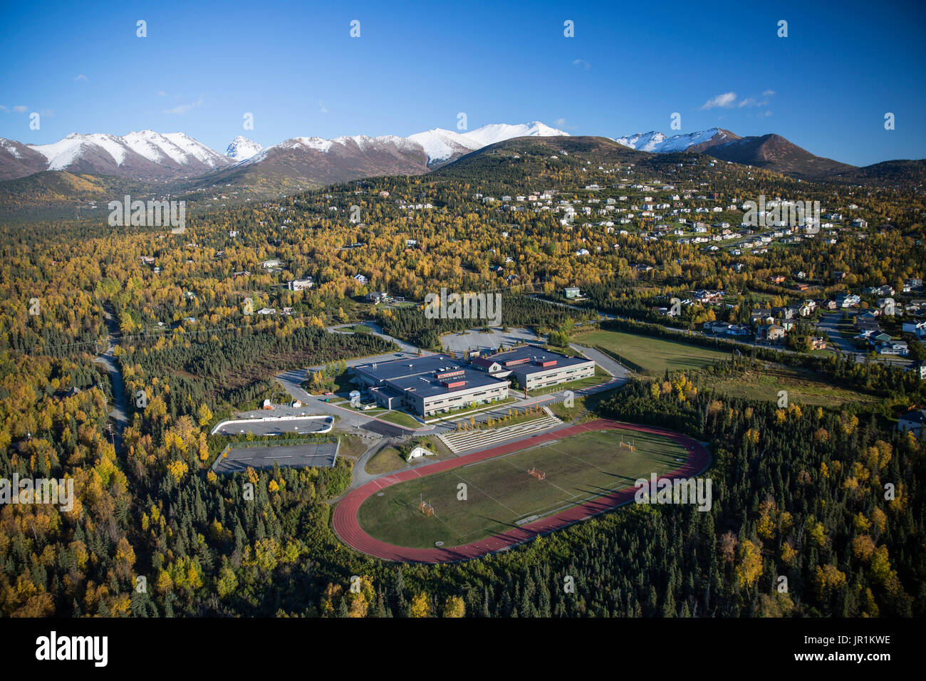 Aerial View Of A School And Nearby Track Field In Autumn, Anchorage ...