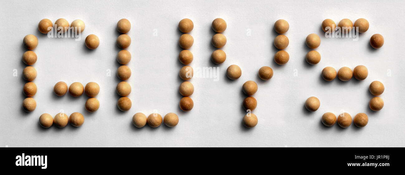 Photograph of the word "Guys" spelled out with wood push pins Stock ...